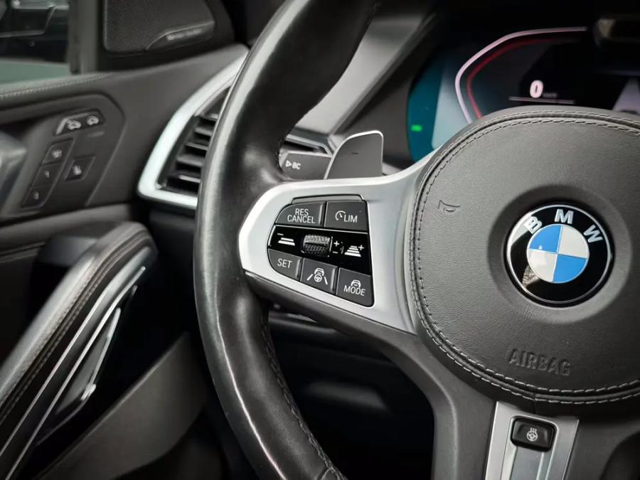 Black BMW X6 2020 in Riga, with an engine capacity of 3.00 L and mileage of 92 thousand km for 55900 €, photo 22 on AUTOMOTO.COM.LV