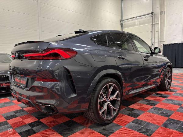 Black BMW X6 2020 in Vilnius, with an engine capacity of 3.00 L and mileage of 145 thousand km for 53500 €, photo 4 on AUTOMOTO.COM.LV