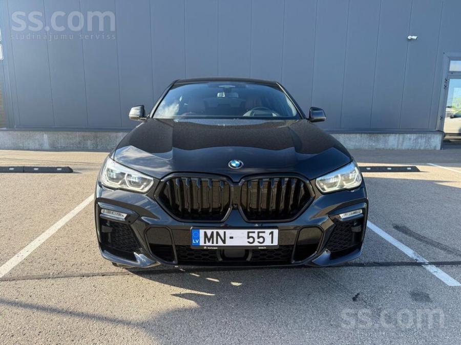 Black BMW X6 2020 in Riga, with an engine capacity of 3.00 L and mileage of 155 thousand km for 48500 €, photo 8 on AUTOMOTO.COM.LV