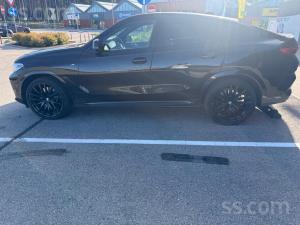 Melns BMW X6 2020 Rīga, ar dzinēja tilpumu 3.00 L un nobraukumu 155 tūkst. km par 42500 €, foto  vietnē AUTOMOTO.COM.LV