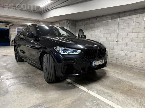 Черный БМВ Х6 2020 в Рига, объемом двигателя 3.00 л и пробегом 96 тыс. км за 64000 €, фото 1 на AUTOMOTO.COM.LV