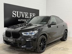 Black BMW X6 2021 in Tallinn, with an engine capacity of 3.00 L and mileage of 145 thousand km for 53995 €, photo  on AUTOMOTO.COM.LV