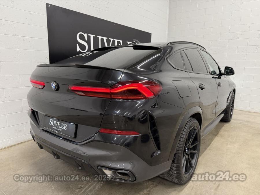 Melns BMW X6 2021 Tallina, ar dzinēja tilpumu 3.00 L un nobraukumu 145 tūkst. km par 53995 €, foto 8 vietnē AUTOMOTO.COM.LV