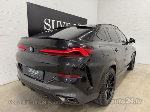 Black BMW X6 2021 in Tallinn, with an engine capacity of 3.00 L and mileage of 145 thousand km for 52995 €, photo 8 on AUTOMOTO.COM.LV