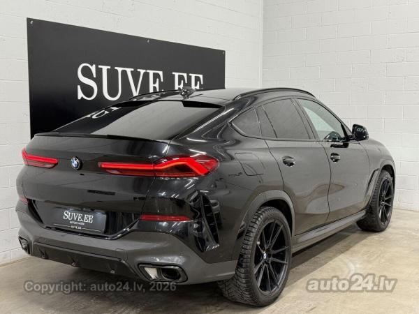 Melns BMW X6 2021 Tallina, ar dzinēja tilpumu 3.00 L un nobraukumu 145 tūkst. km par 52995 €, foto 9 vietnē AUTOMOTO.COM.LV