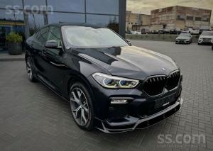 Black BMW X6 2021 in Telschi, with an engine capacity of 3.00 L and mileage of 177 thousand km for 56399 €, photo  on AUTOMOTO.COM.LV