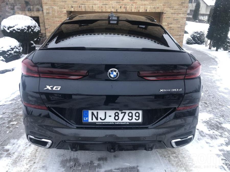 Black BMW X6 2021 in Cesis, with an engine capacity of 3.00 L and mileage of 115 thousand km for 59800 €, photo 2 on AUTOMOTO.COM.LV