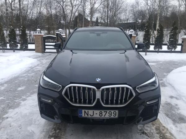 Black BMW X6 2021 in Cesis, with an engine capacity of 3.00 L and mileage of 115 thousand km for 59800 €, photo 4 on AUTOMOTO.COM.LV