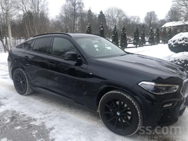 Black BMW X6 2021 in Cesis, with an engine capacity of 3.00 L and mileage of 115 thousand km for 59800 €, photo 5 on AUTOMOTO.COM.LV