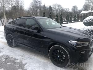 Black BMW X6 2021 in Cesis, with an engine capacity of 3.00 L and mileage of 115 thousand km for 59800 €, photo 5 on AUTOMOTO.COM.LV