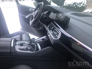 Black BMW X6 2021 in Cesis, with an engine capacity of 3.00 L and mileage of 115 thousand km for 59800 €, photo 12 on AUTOMOTO.COM.LV