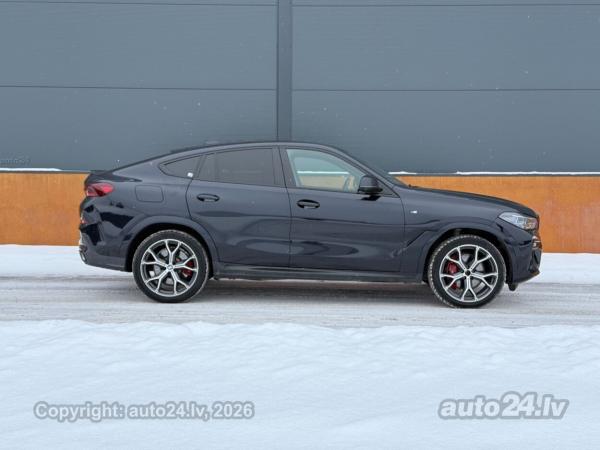 Melns BMW X6 2021 Tallina, ar dzinēja tilpumu 3.00 L un nobraukumu 104 tūkst. km par 58900 €, foto 6 vietnē AUTOMOTO.COM.LV