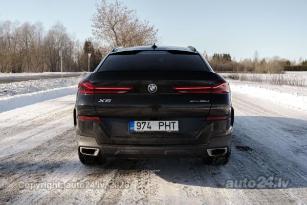 Melns BMW X6 2021 Tartu, ar dzinēja tilpumu 3.00 L un nobraukumu 129 tūkst. km par 58000 €, foto 5 vietnē AUTOMOTO.COM.LV