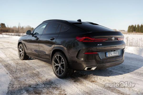 Melns BMW X6 2021 Tartu, ar dzinēja tilpumu 3.00 L un nobraukumu 129 tūkst. km par 58000 €, foto 6 vietnē AUTOMOTO.COM.LV