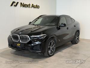 Black BMW X6 2021 in Tartu, with an engine capacity of 3.00 L and mileage of 129 thousand km for 58000 €, photo  on AUTOMOTO.COM.LV