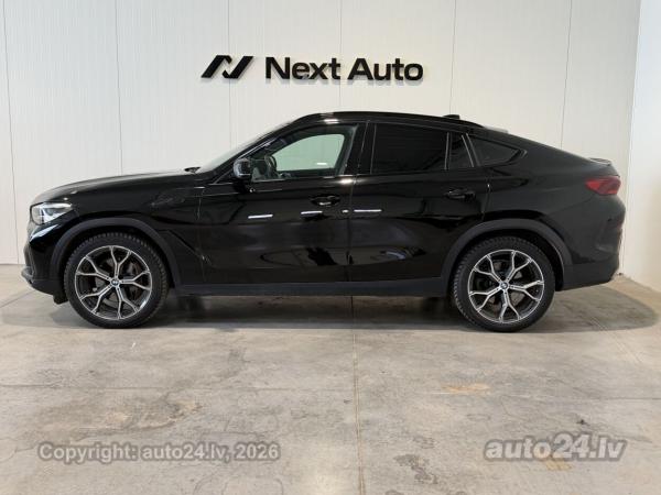 Black BMW X6 2021 in Tartu, with an engine capacity of 3.00 L and mileage of 129 thousand km for 58000 €, photo 3 on AUTOMOTO.COM.LV