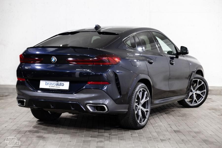 Black BMW X6 2021 in Vilnius, with an engine capacity of 3.00 L and mileage of 107 thousand km for 59491 €, photo 11 on AUTOMOTO.COM.LV