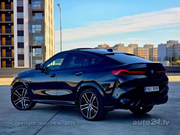 Black BMW X6 2021 in Tallinn, with an engine capacity of 3.00 L and mileage of 164 thousand km for 54890 €, photo 4 on AUTOMOTO.COM.LV