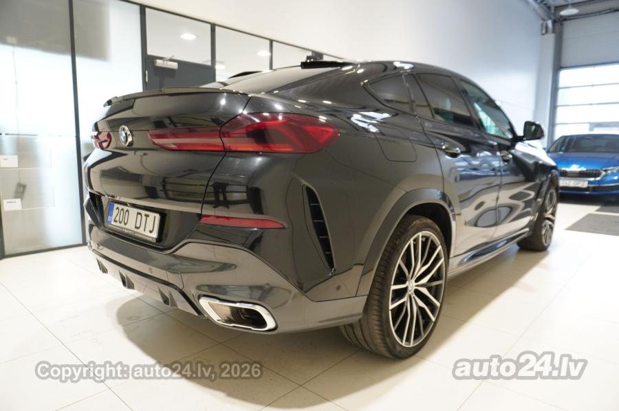 Melns BMW X6 2021 Tallina, ar dzinēja tilpumu 3.00 L un nobraukumu 146 tūkst. km par 53000 €, foto 4 vietnē AUTOMOTO.COM.LV