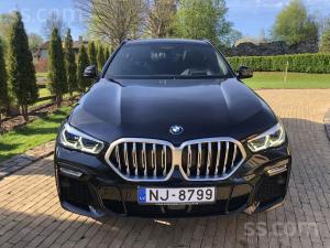 Black BMW X6 2021 in Cesis, with an engine capacity of 3.00 L and mileage of 122 thousand km for 53750 €, photo 3 on AUTOMOTO.COM.LV