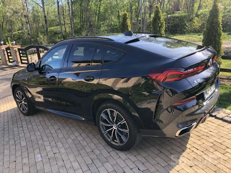 Black BMW X6 2021 in Cesis, with an engine capacity of 3.00 L and mileage of 122 thousand km for 53750 €, photo 4 on AUTOMOTO.COM.LV
