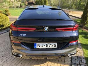 Black BMW X6 2021 in Cesis, with an engine capacity of 3.00 L and mileage of 122 thousand km for 53750 €, photo 5 on AUTOMOTO.COM.LV