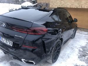 Black BMW X6 2021 in Cesis, with an engine capacity of 3.00 L and mileage of 115 thousand km for 58700 €, photo  on AUTOMOTO.COM.LV