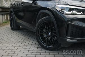 Black BMW X6 2021 in Riga, with an engine capacity of 3.00 L and mileage of 73 thousand km for 51500 €, photo 12 on AUTOMOTO.COM.LV