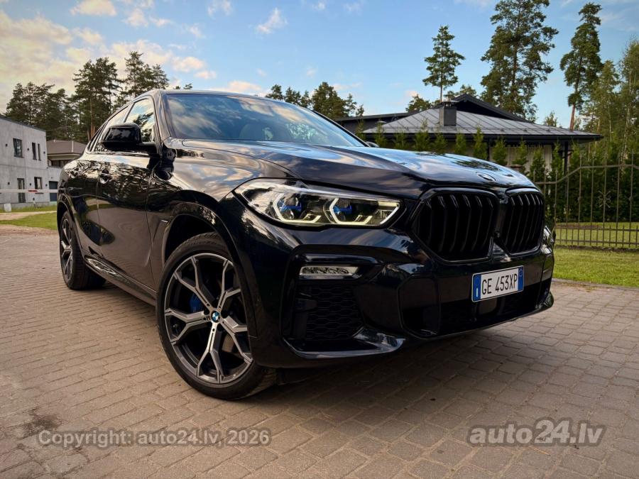 Black BMW X6 2021 in Riga, with an engine capacity of 3.00 L and mileage of 206 thousand km for 48850 €, photo 6 on AUTOMOTO.COM.LV