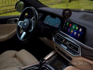 Black BMW X6 2021 in Riga, with an engine capacity of 3.00 L and mileage of 206 thousand km for 48850 €, photo 7 on AUTOMOTO.COM.LV
