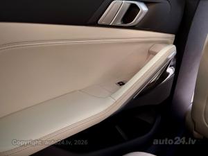 Black BMW X6 2021 in Riga, with an engine capacity of 3.00 L and mileage of 206 thousand km for 48850 €, photo 12 on AUTOMOTO.COM.LV