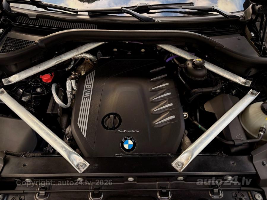Black BMW X6 2021 in Riga, with an engine capacity of 3.00 L and mileage of 206 thousand km for 48850 €, photo 14 on AUTOMOTO.COM.LV