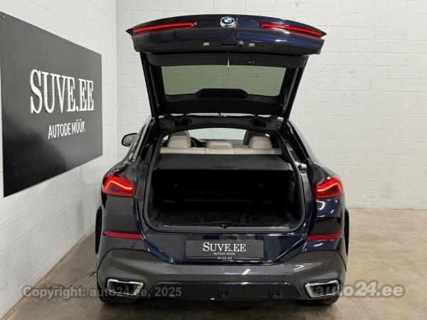 Melns BMW X6 2022 Tallina, ar dzinēja tilpumu 3.00 L un nobraukumu 60 tūkst. km par 67995 €, foto 11 vietnē AUTOMOTO.COM.LV