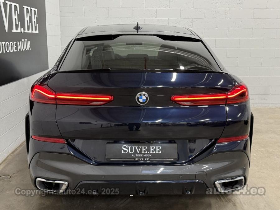 Melns BMW X6 2022 Tallina, ar dzinēja tilpumu 3.00 L un nobraukumu 60 tūkst. km par 65995 €, foto 10 vietnē AUTOMOTO.COM.LV