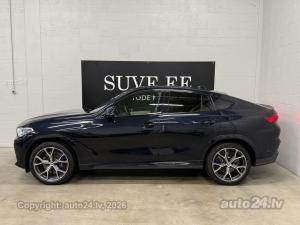 Melns BMW X6 2022 Tallina, ar dzinēja tilpumu 3.00 L un nobraukumu 60 tūkst. km par 63995 €, foto 4 vietnē AUTOMOTO.COM.LV