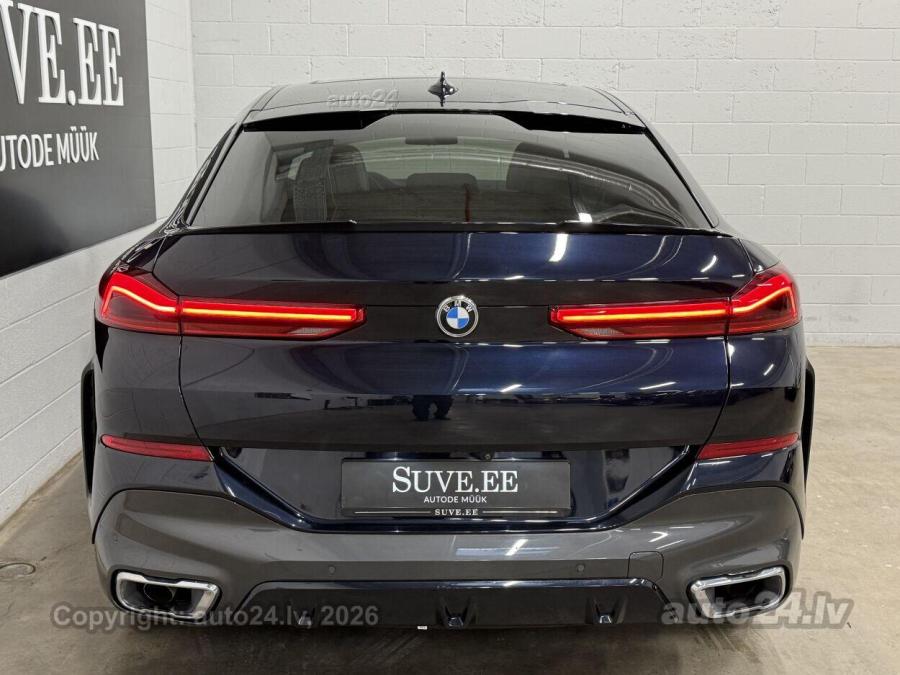 Melns BMW X6 2022 Tallina, ar dzinēja tilpumu 3.00 L un nobraukumu 60 tūkst. km par 63995 €, foto 9 vietnē AUTOMOTO.COM.LV