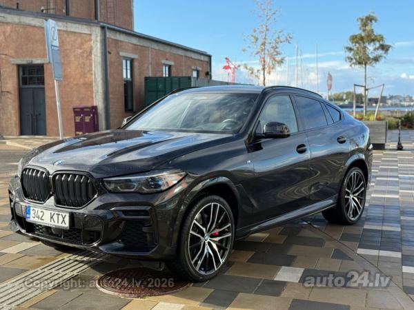 Black BMW X6 2022 in Tallinn, with an engine capacity of 3.00 L and mileage of 43 thousand km for 67490 €, photo 1 on AUTOMOTO.COM.LV