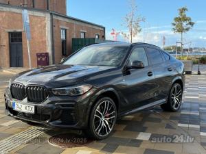 Black BMW X6 2022 in Tallinn, with an engine capacity of 3.00 L and mileage of 43 thousand km for 67490 €, photo  on AUTOMOTO.COM.LV