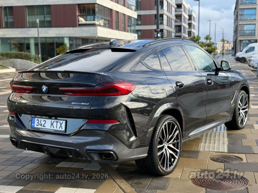 Black BMW X6 2022 in Tallinn, with an engine capacity of 3.00 L and mileage of 43 thousand km for 67490 €, photo 6 on AUTOMOTO.COM.LV