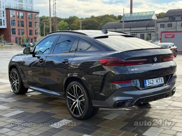 Black BMW X6 2022 in Tallinn, with an engine capacity of 3.00 L and mileage of 43 thousand km for 67490 €, photo 7 on AUTOMOTO.COM.LV