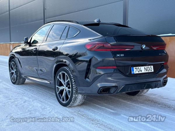 Black BMW X6 2022 in Tallinn, with an engine capacity of 3.00 L and mileage of 91 thousand km for 59900 €, photo 4 on AUTOMOTO.COM.LV