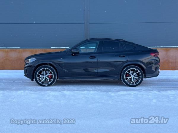 Black BMW X6 2022 in Tallinn, with an engine capacity of 3.00 L and mileage of 91 thousand km for 59900 €, photo 5 on AUTOMOTO.COM.LV