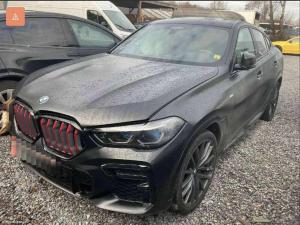 Black BMW X6 2022 in Klaipeda, with an engine capacity of 2.99 L and mileage of 52 thousand km for 40000 €, photo  on AUTOMOTO.COM.LV