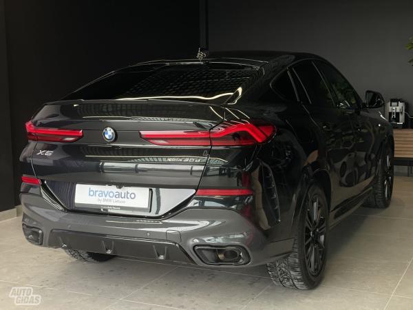 Black BMW X6 2022 in Klaipeda, with an engine capacity of 3.00 L and mileage of 89 thousand km for 58991 €, photo 4 on AUTOMOTO.COM.LV