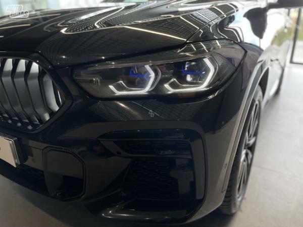 Black BMW X6 2022 in Klaipeda, with an engine capacity of 3.00 L and mileage of 89 thousand km for 58991 €, photo 9 on AUTOMOTO.COM.LV