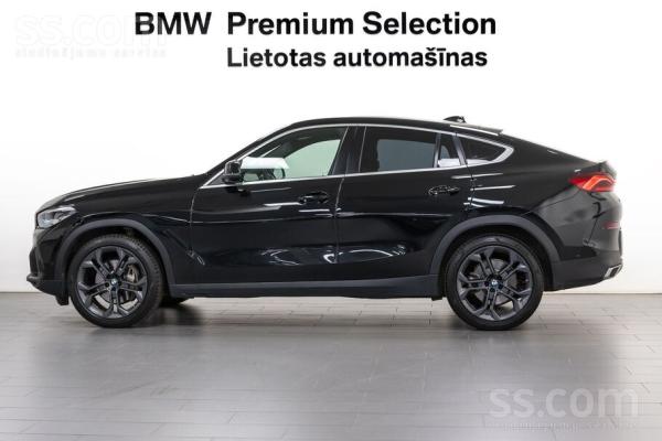 Black BMW X6 2022 in Riga, with an engine capacity of 3.00 L and mileage of 54 thousand km for 49900 €, photo 8 on AUTOMOTO.COM.LV