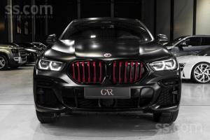 Black BMW X6 2022 in Riga, with an engine capacity of 3.00 L and mileage of 39 thousand km for 66550 €, photo 3 on AUTOMOTO.COM.LV