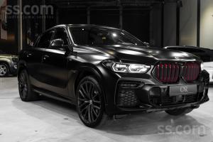 Black BMW X6 2022 in Riga, with an engine capacity of 3.00 L and mileage of 39 thousand km for 66550 €, photo 4 on AUTOMOTO.COM.LV