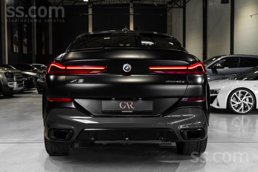Black BMW X6 2022 in Riga, with an engine capacity of 3.00 L and mileage of 39 thousand km for 66550 €, photo 5 on AUTOMOTO.COM.LV