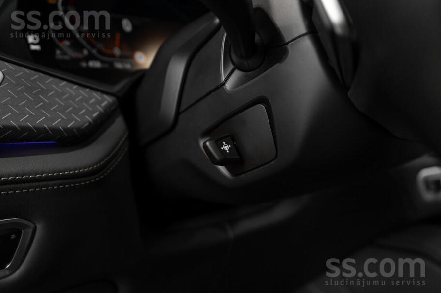 Black BMW X6 2022 in Riga, with an engine capacity of 3.00 L and mileage of 39 thousand km for 66550 €, photo 22 on AUTOMOTO.COM.LV